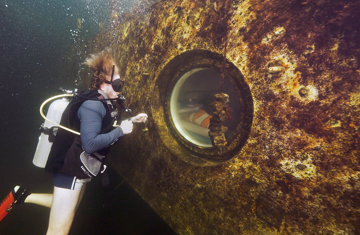 Man Diving Underwater